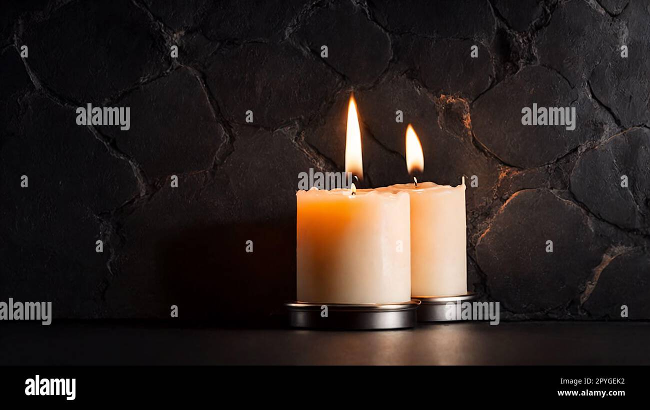 Two burning wax candles on black floor and dark stone background Stock ...