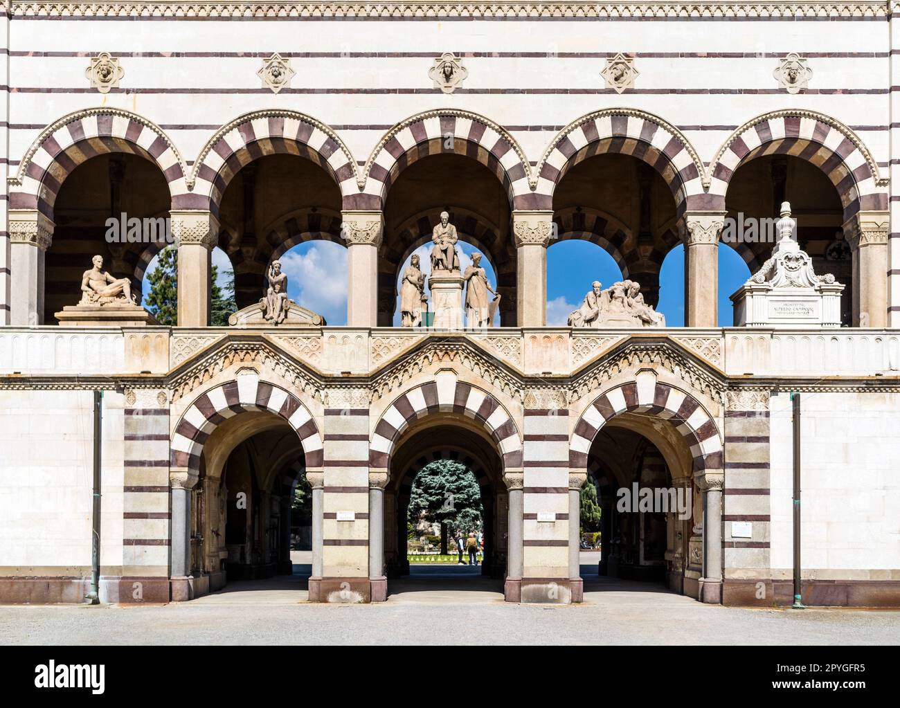 West gallery with sculptures and graves in the Monumental Cemetery of ...