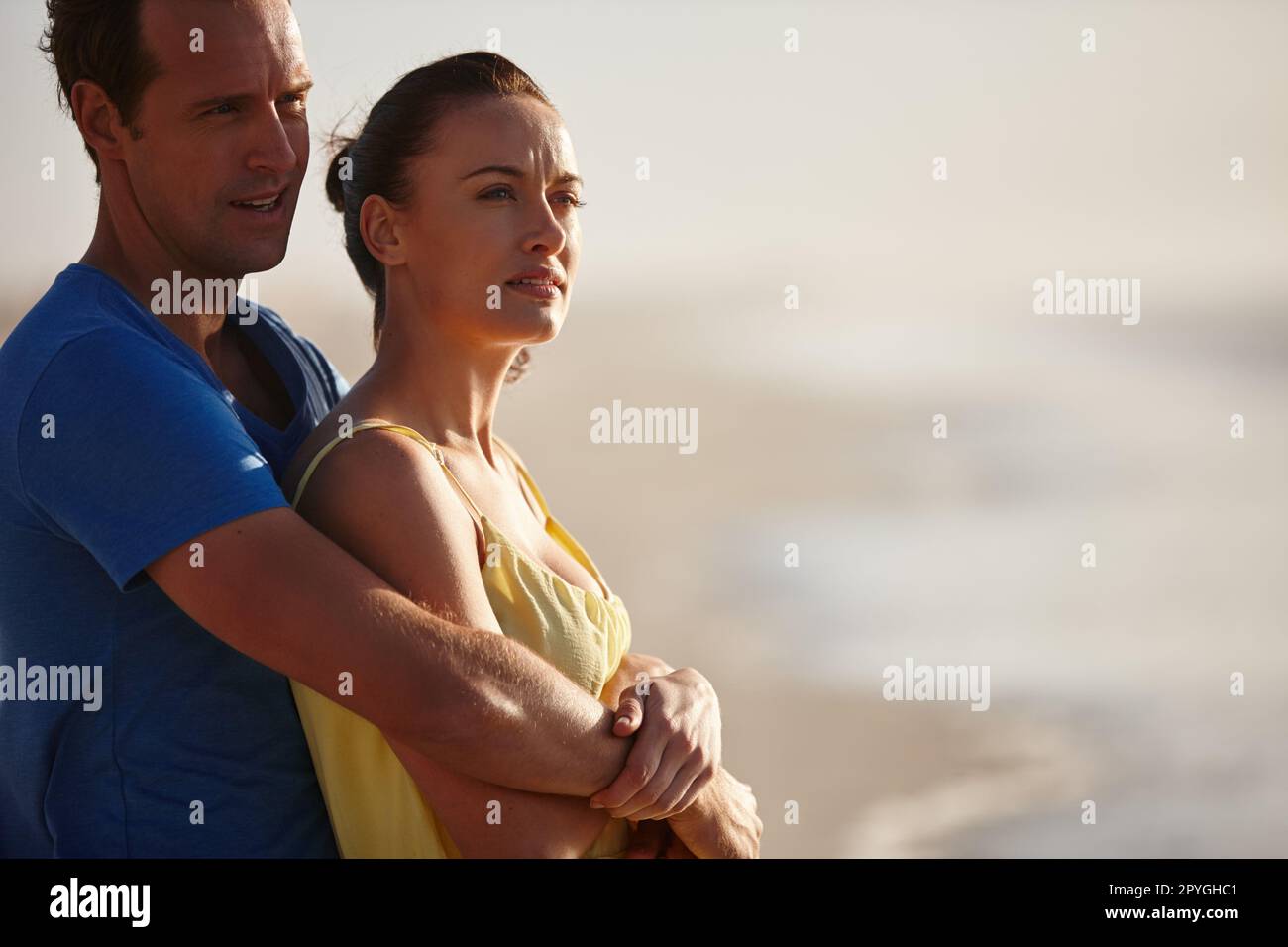 Romantic thoughts on the beach. an affectionate couple on the beach ...