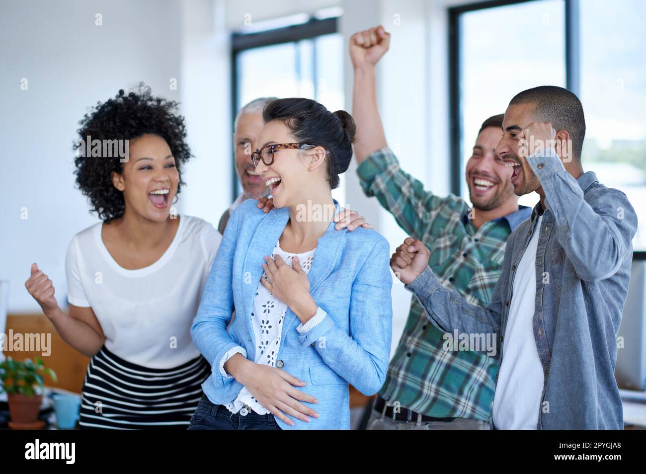 Excited coworkers hi-res stock photography and images - Alamy