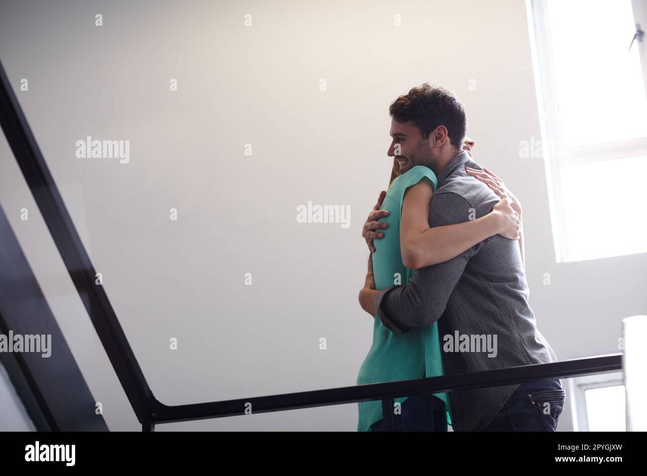 Two people hugging hi-res stock photography and images - Alamy