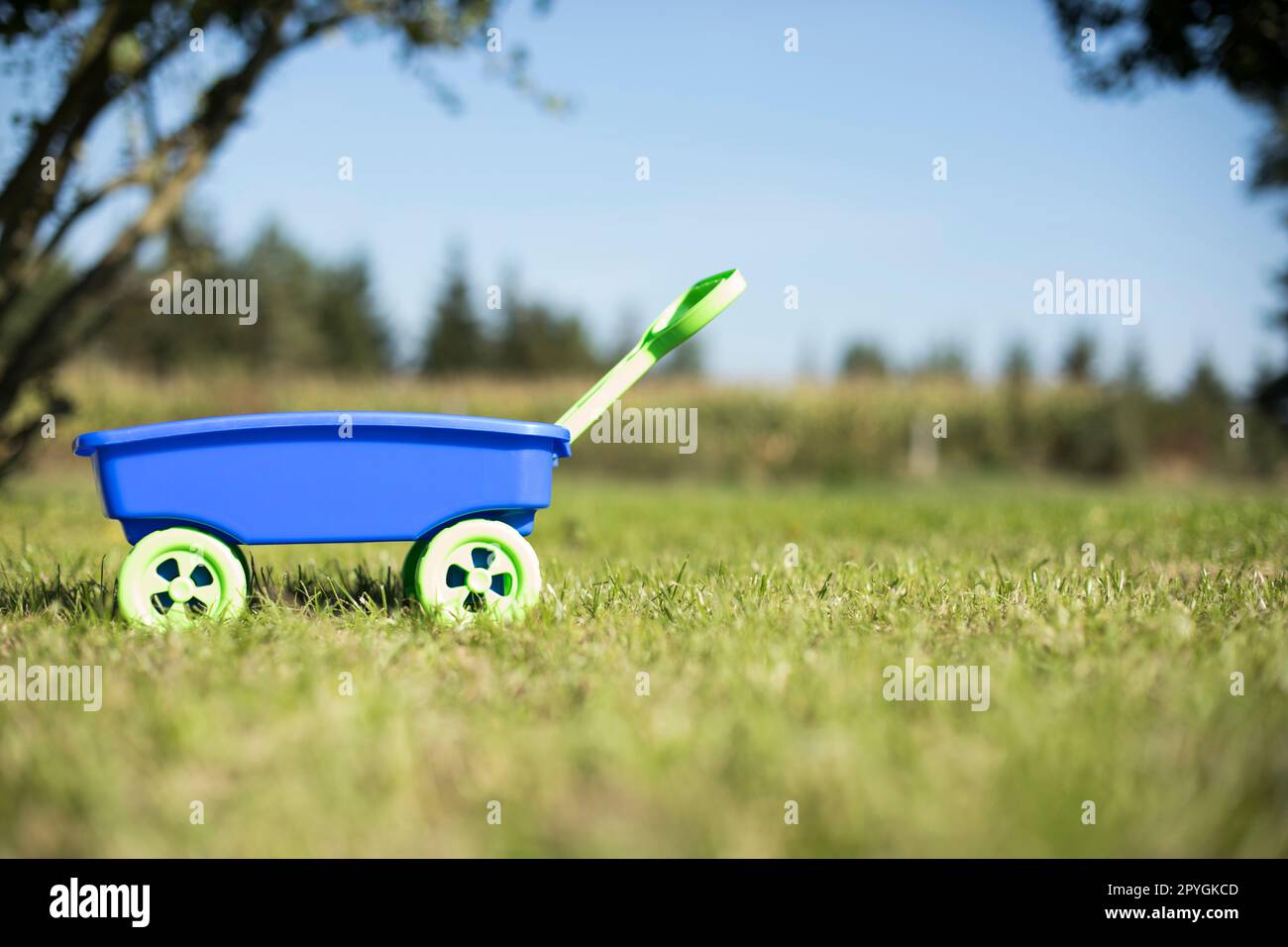 Pulling toy wagon hi-res stock photography and images - Alamy