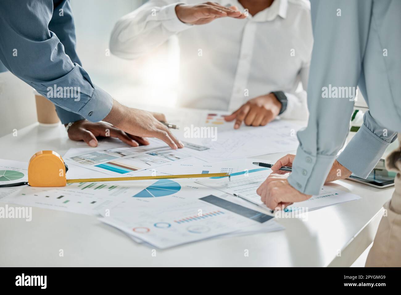 Paperwork, office and team planning a project together in conference ...