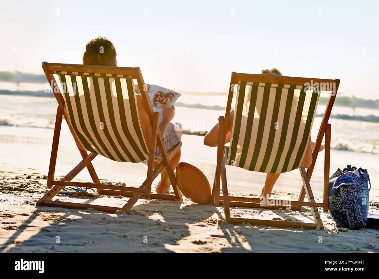 Seated on the beach hi-res stock photography and images - Alamy