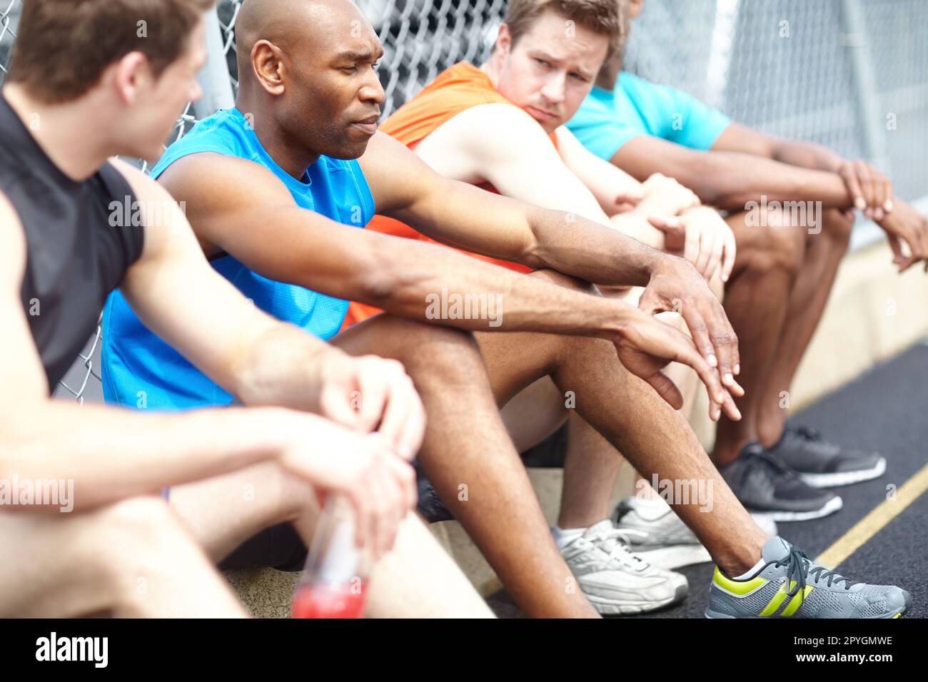 Resting before the next training session. Cropped side view of male ...