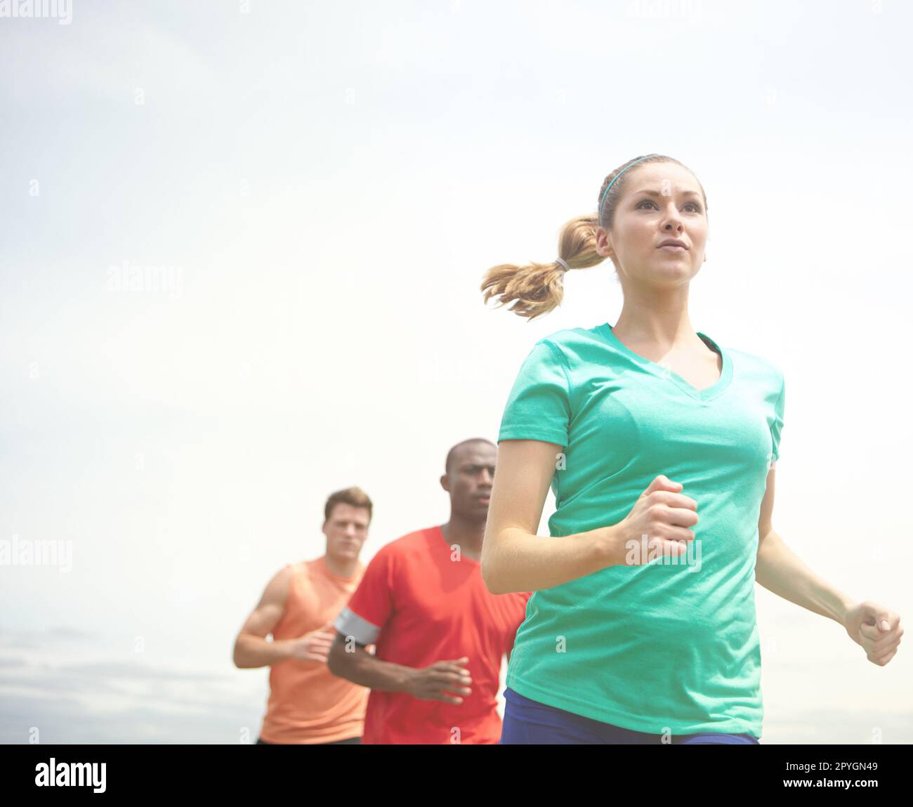 Male female athletes running marathon race hi-res stock photography and ...