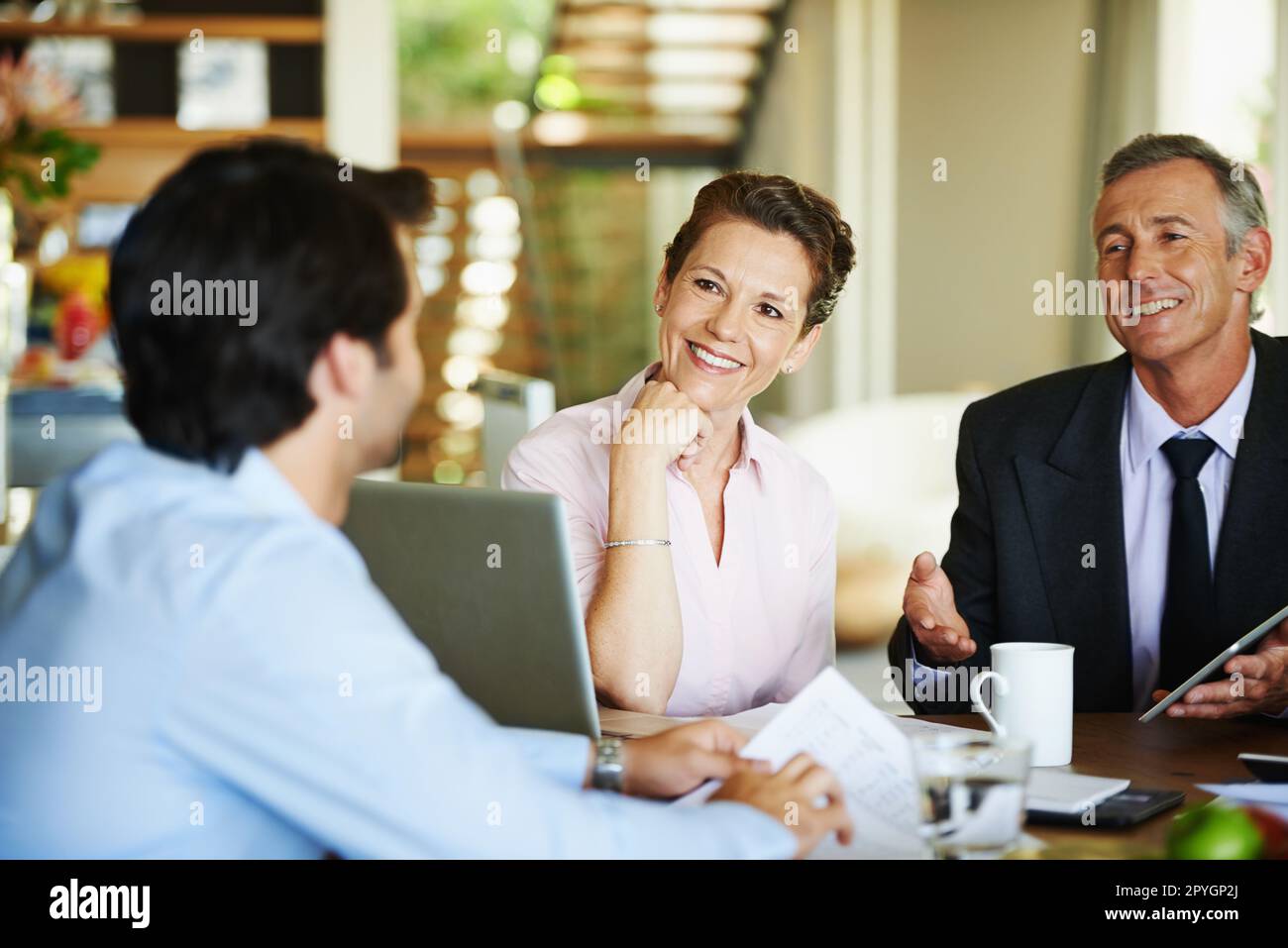 Sharing business ideas. Positive businesspeople having a productive ...
