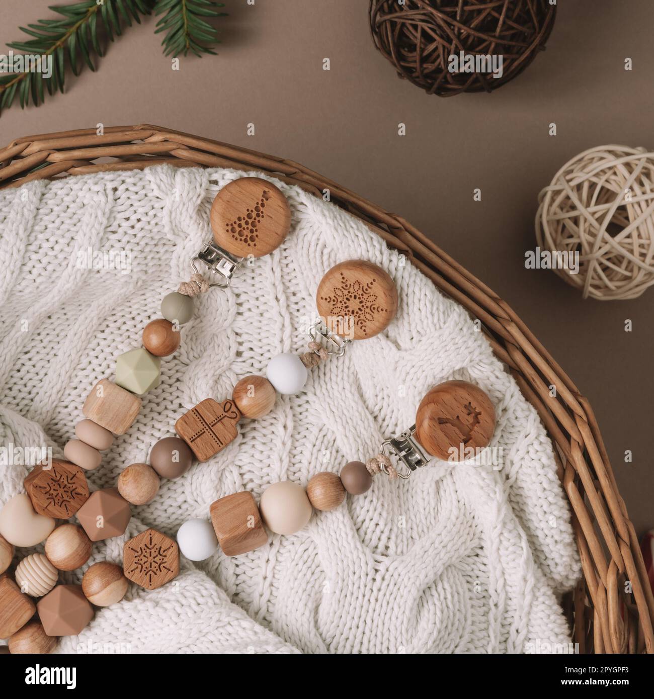 Three Christmas wooden pacifier holders with silicone beads and ...