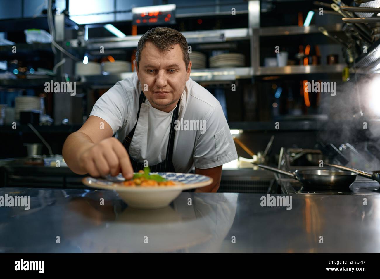 Portrait satisfied italian man eating hi-res stock photography and ...
