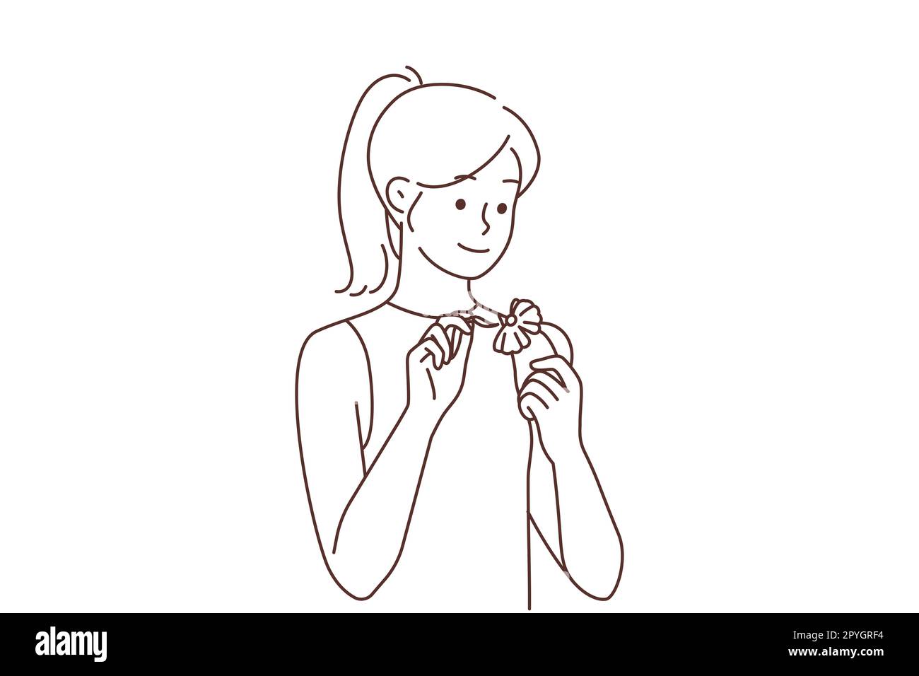 Smiling young woman read fortune on chamomile ask for love. Happy girl ...