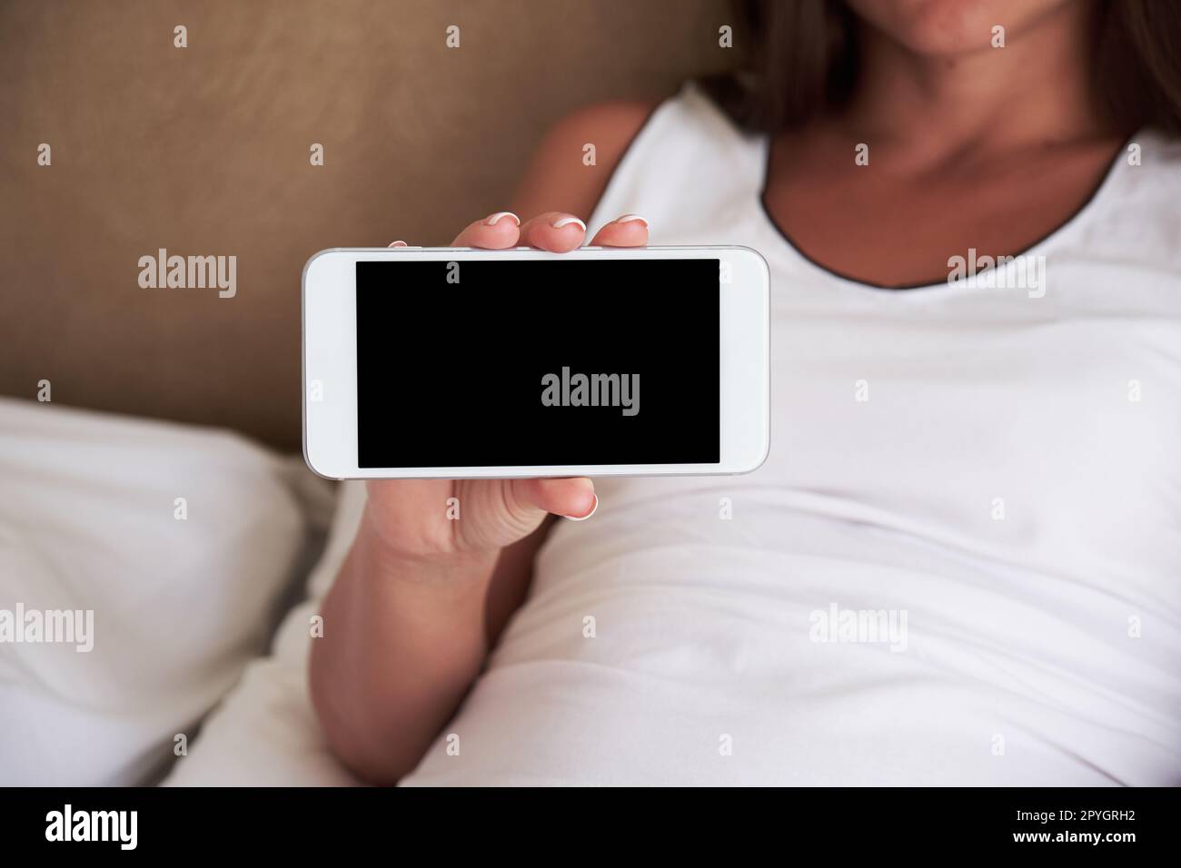 Happy woman demonstrates smartphone screen. Mobile app mockup. Template ...