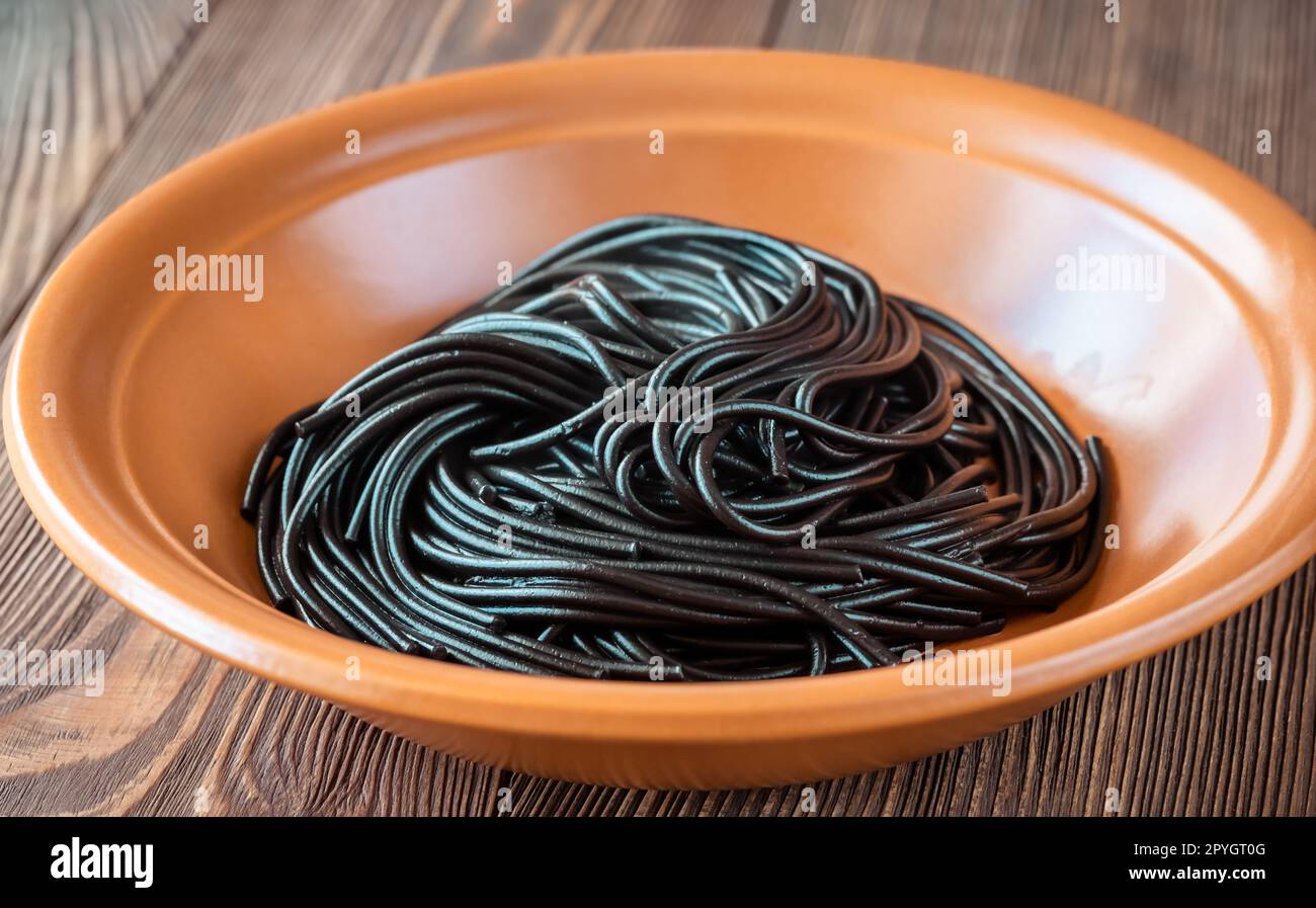 Ink spaghetti healthy black hi-res stock photography and images - Alamy