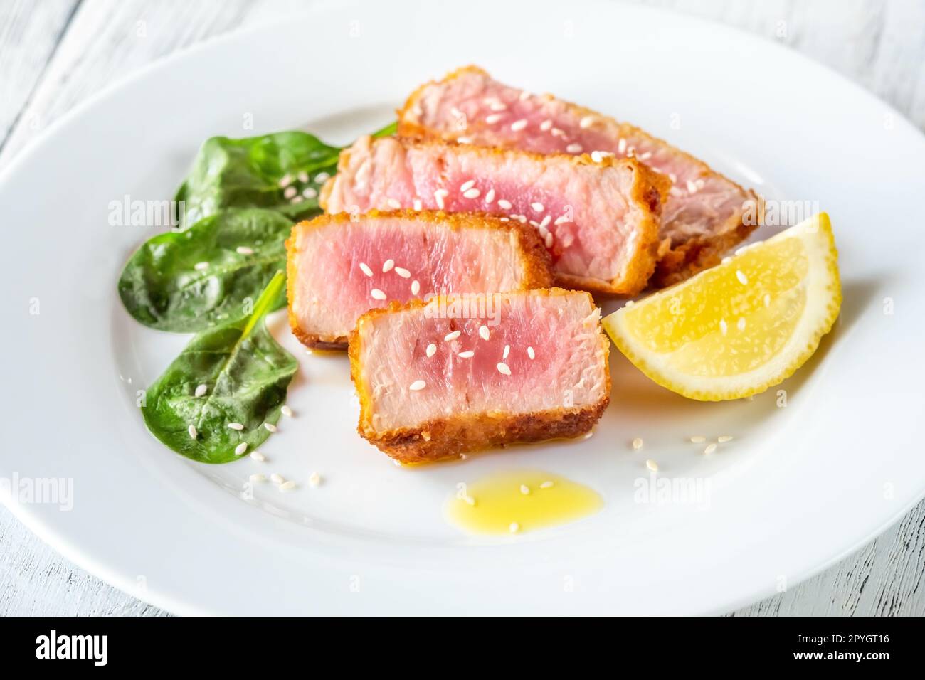 Sliced tuna hi-res stock photography and images - Alamy