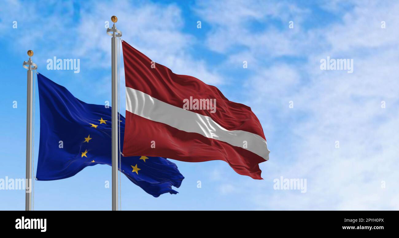 The flags of Latvia and the European Union fluttering together on a ...