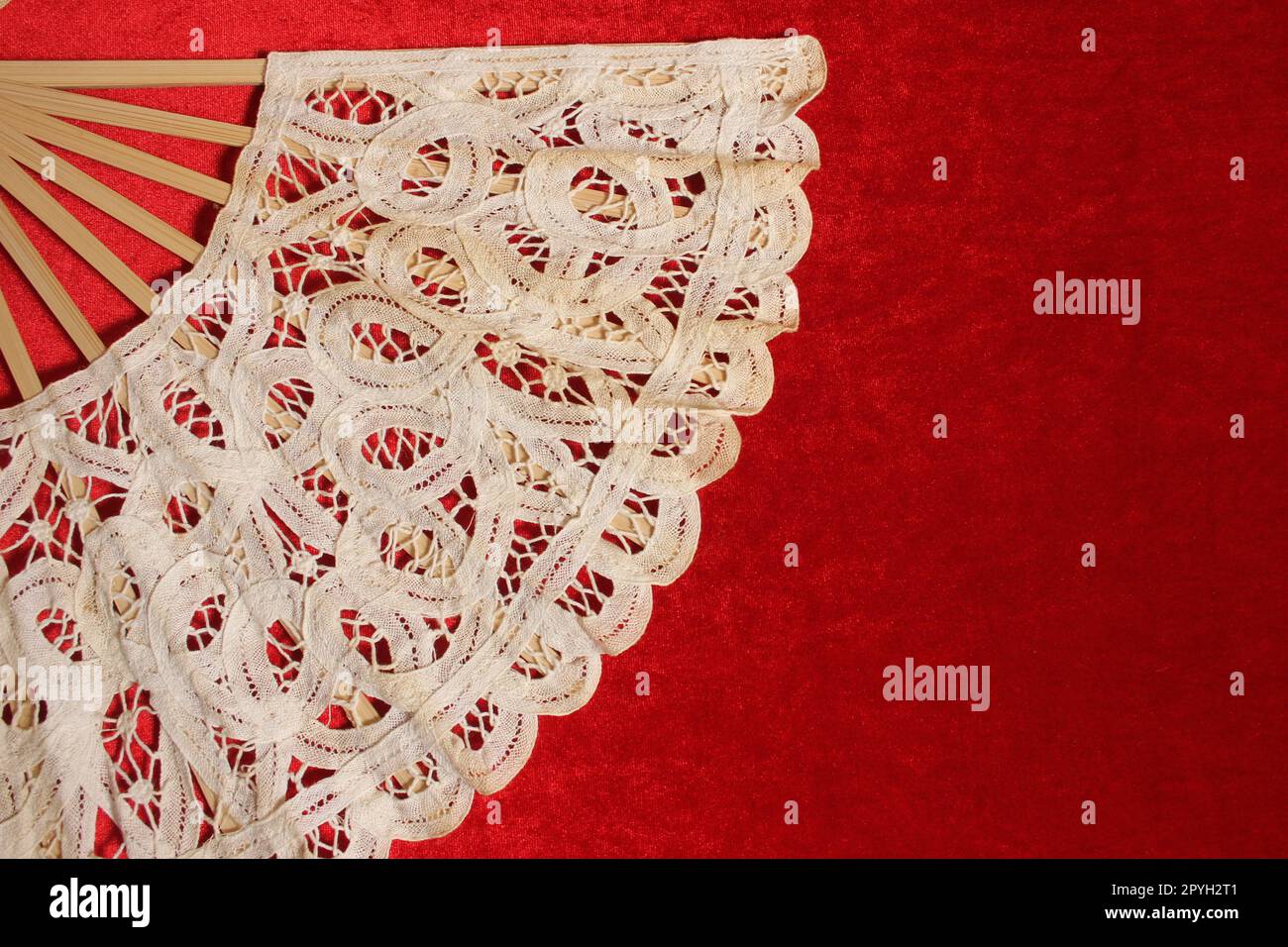 Vintage Lace Hand Fan On Red Velvet Background Stock Photo - Alamy