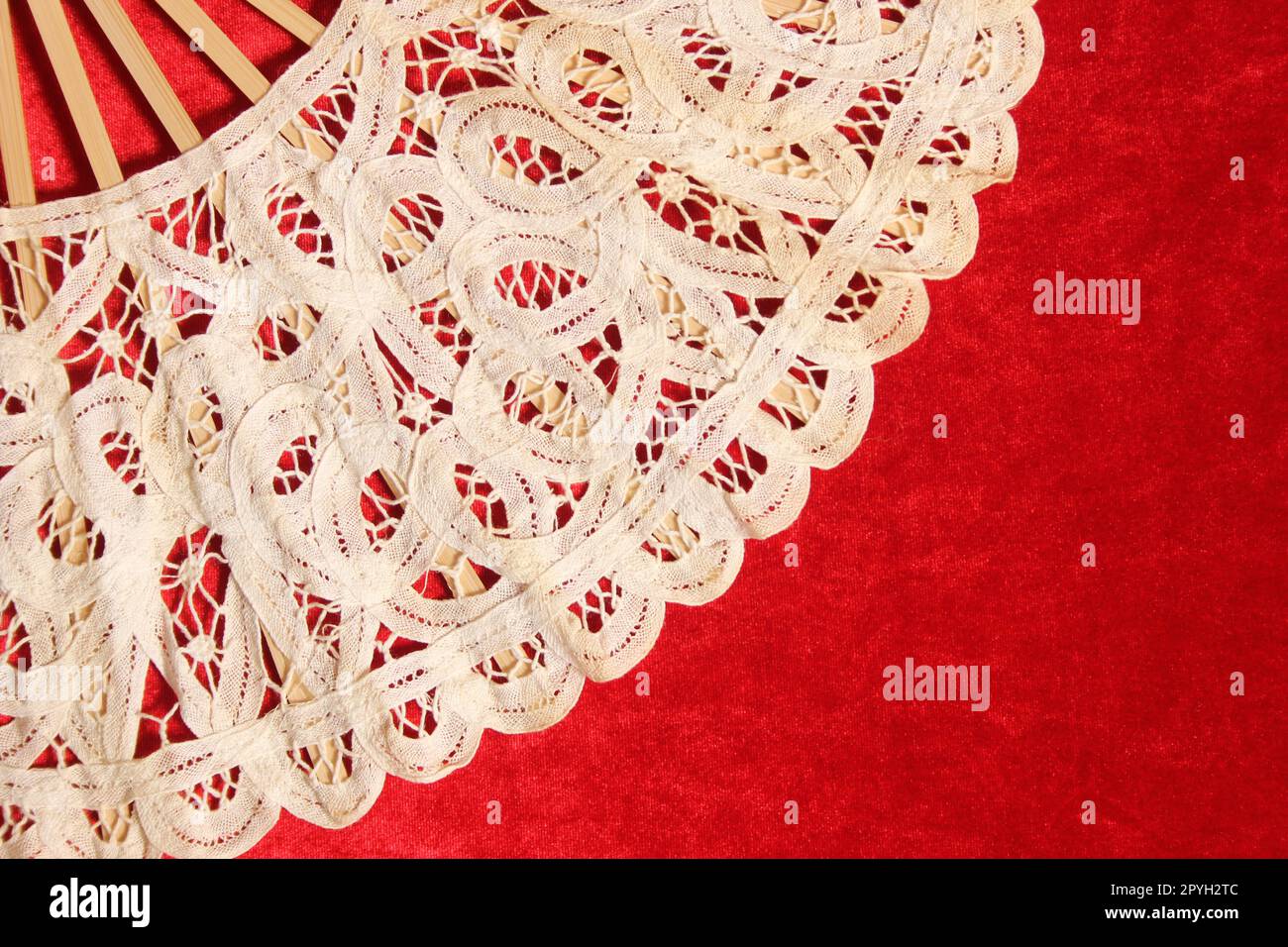 Vintage Lace Hand Fan On Red Velvet Background Stock Photo - Alamy
