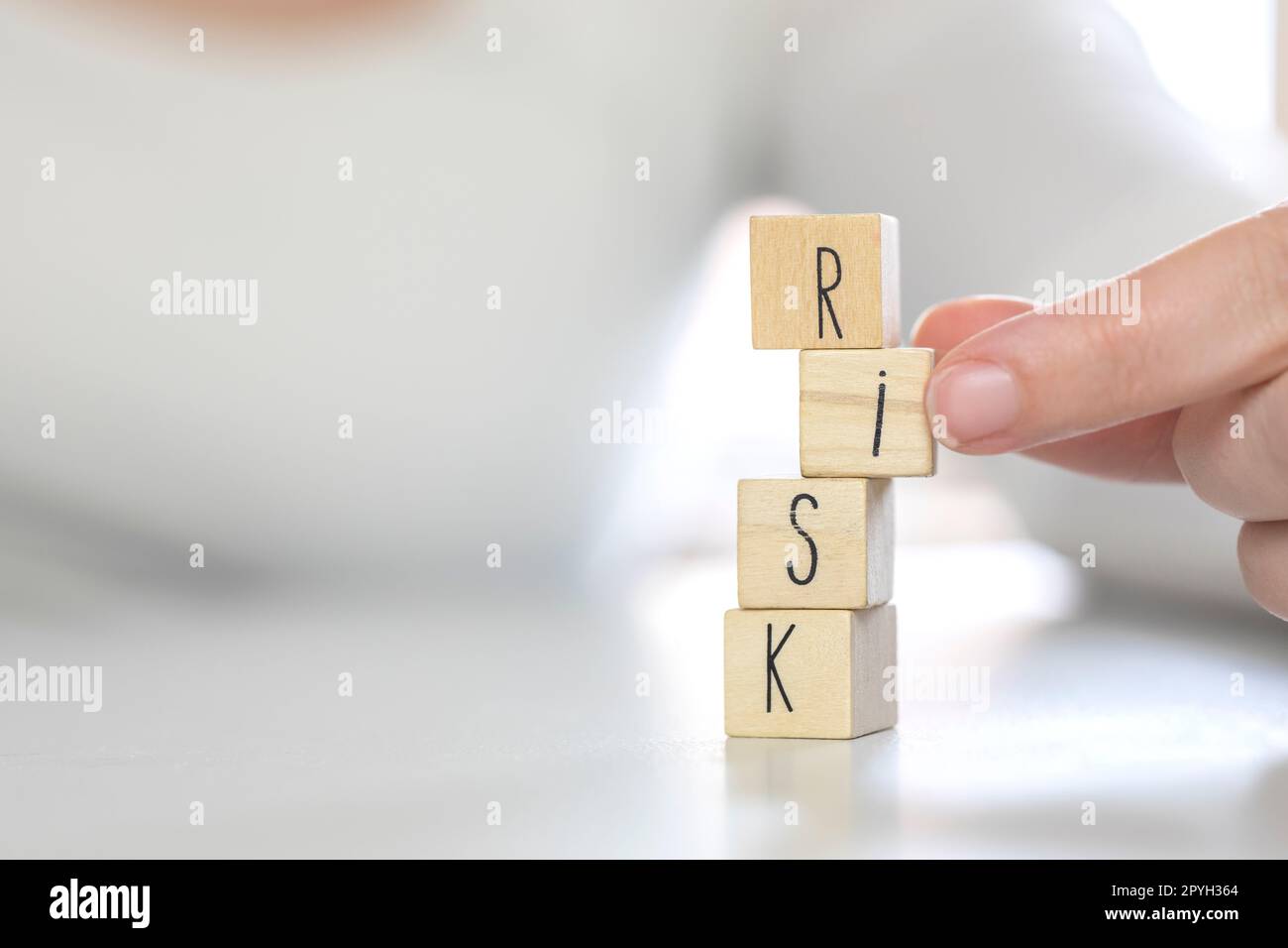 Risk management concept. Business woman, men hand hold wooden cubes ...