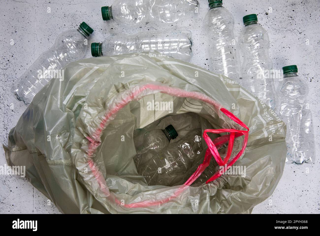 Recycling and ecology concept. Sorting household waste captured from ...