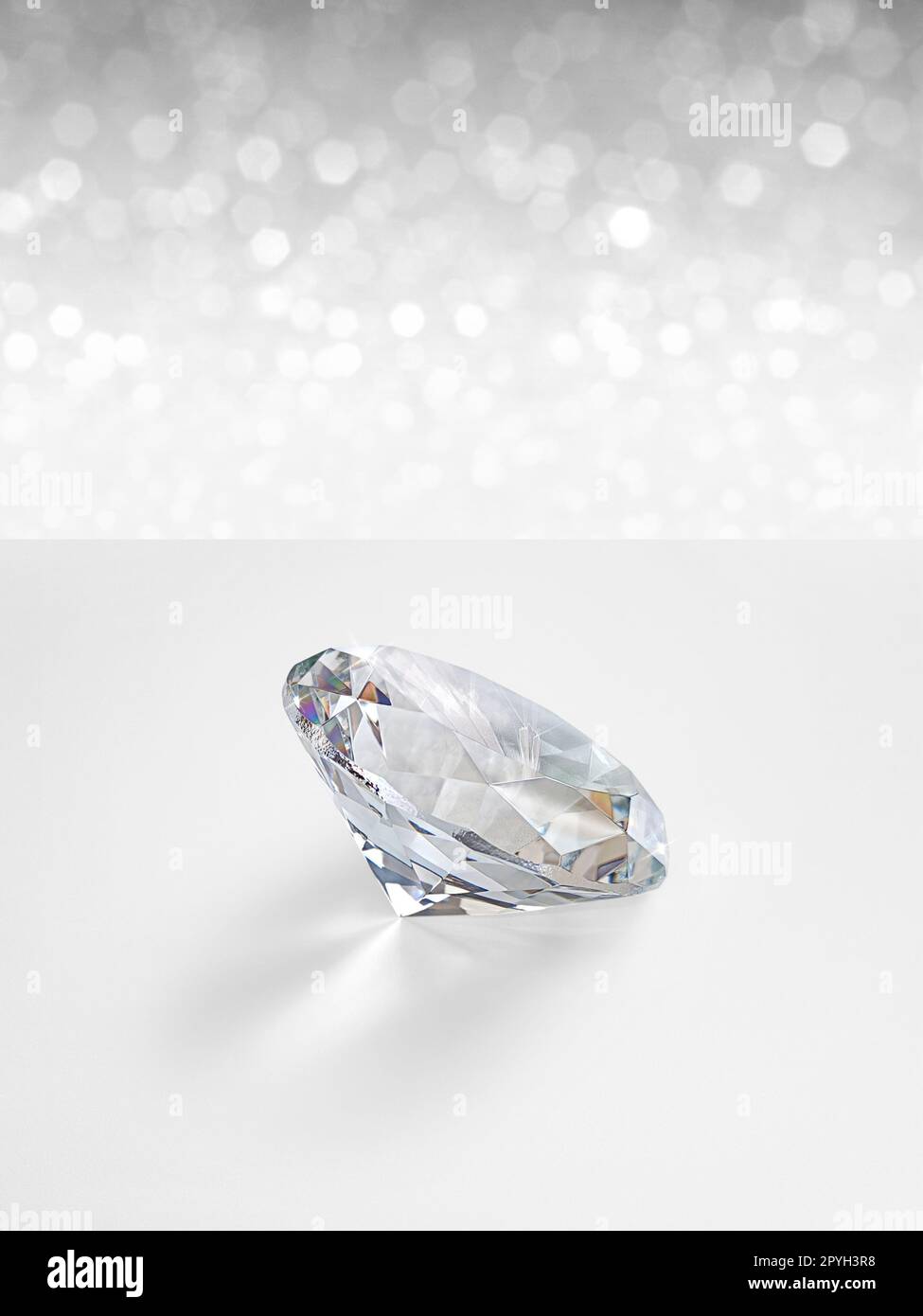 Diamonds of placed on white shining bokeh background. concept for ...