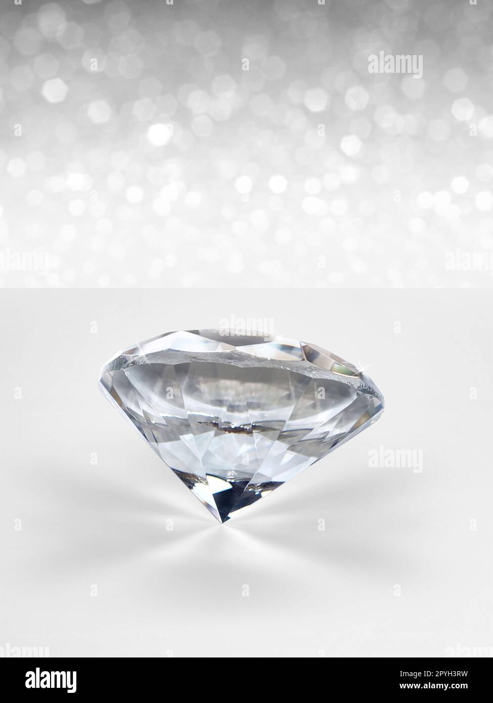 Diamonds of placed on white shining bokeh background. concept for ...