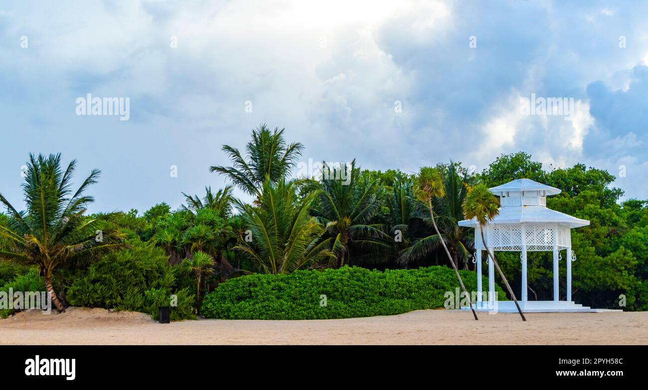 White noble pergula pavilion in paradise on beach palms Mexico Stock ...