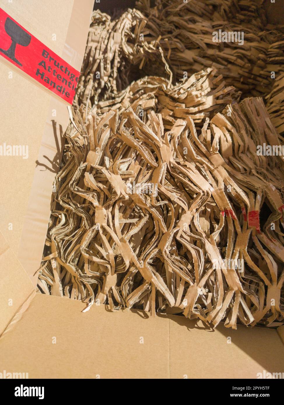 Shredded cardboard filler material hi-res stock photography and images ...