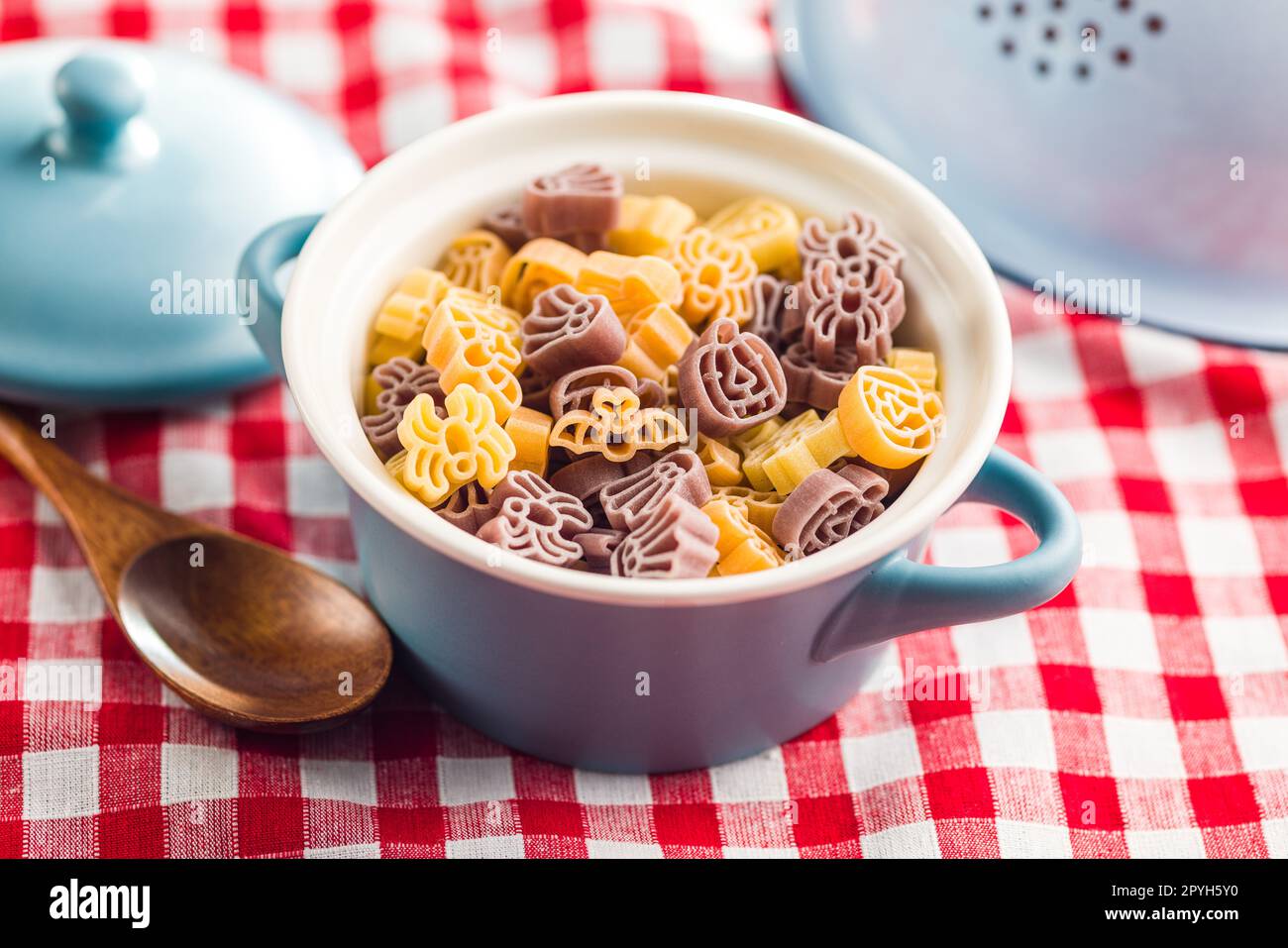 Pasta of various scary shapes. Uncooked halloween pasta in pot Stock ...