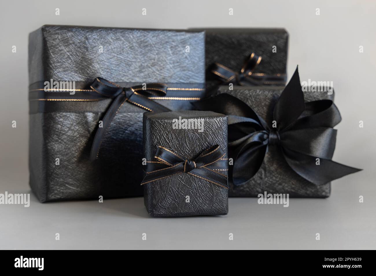 Black gift boxes hi-res stock photography and images - Alamy