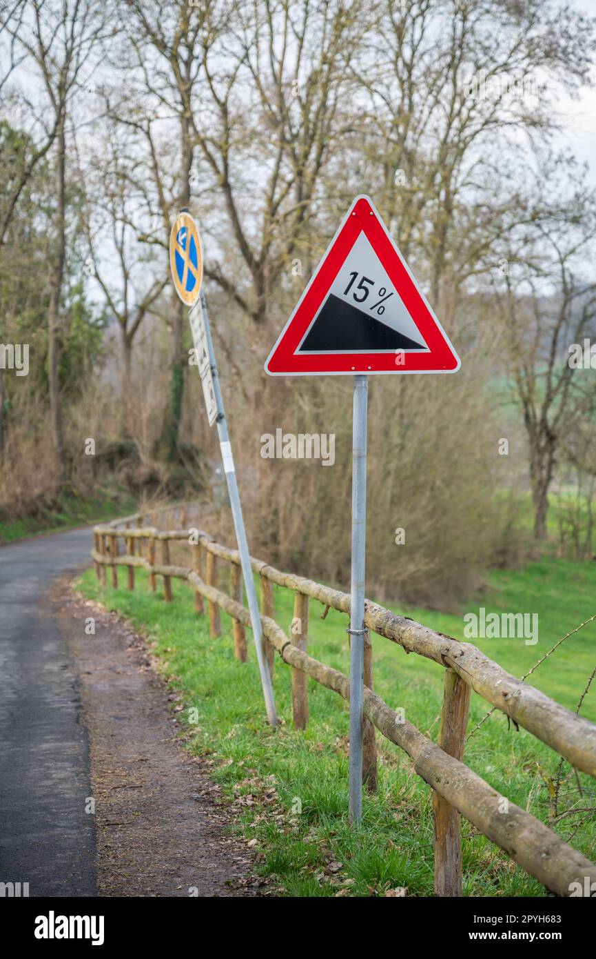 German road sign 15 percent drop at the road mountain, Germany ...