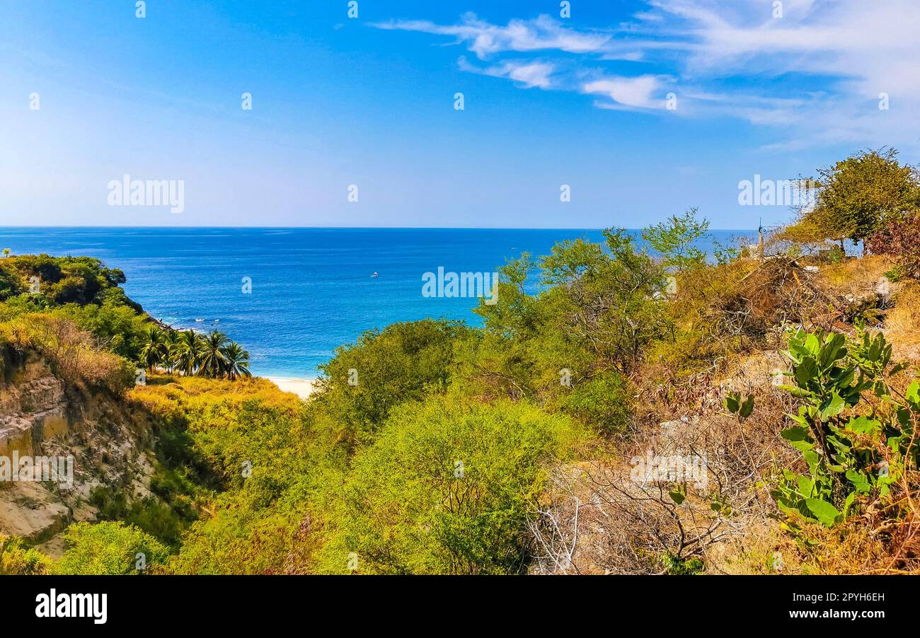 Beautiful rocks cliffs view waves at beach Puerto Escondido Mexico ...