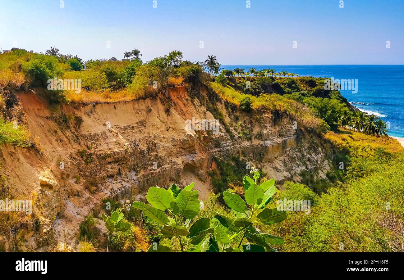 Beautiful rocks cliffs view waves at beach Puerto Escondido Mexico ...