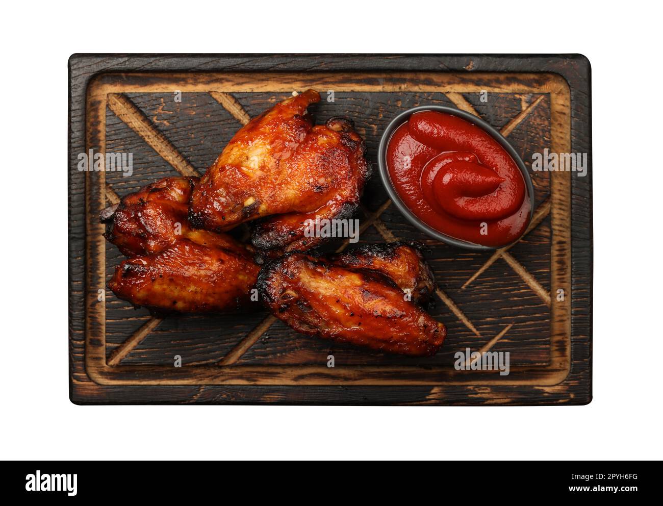 Rustic grilled chicken wings Cut Out Stock Images & Pictures - Alamy