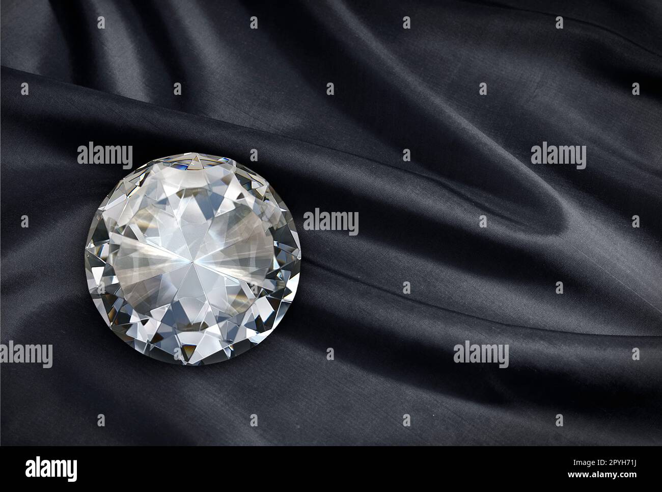 diamond on black fabric background Stock Photo - Alamy