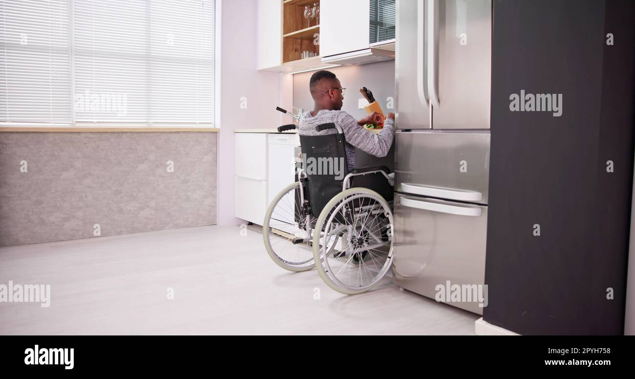 Black man wheel chair hi-res stock photography and images - Alamy