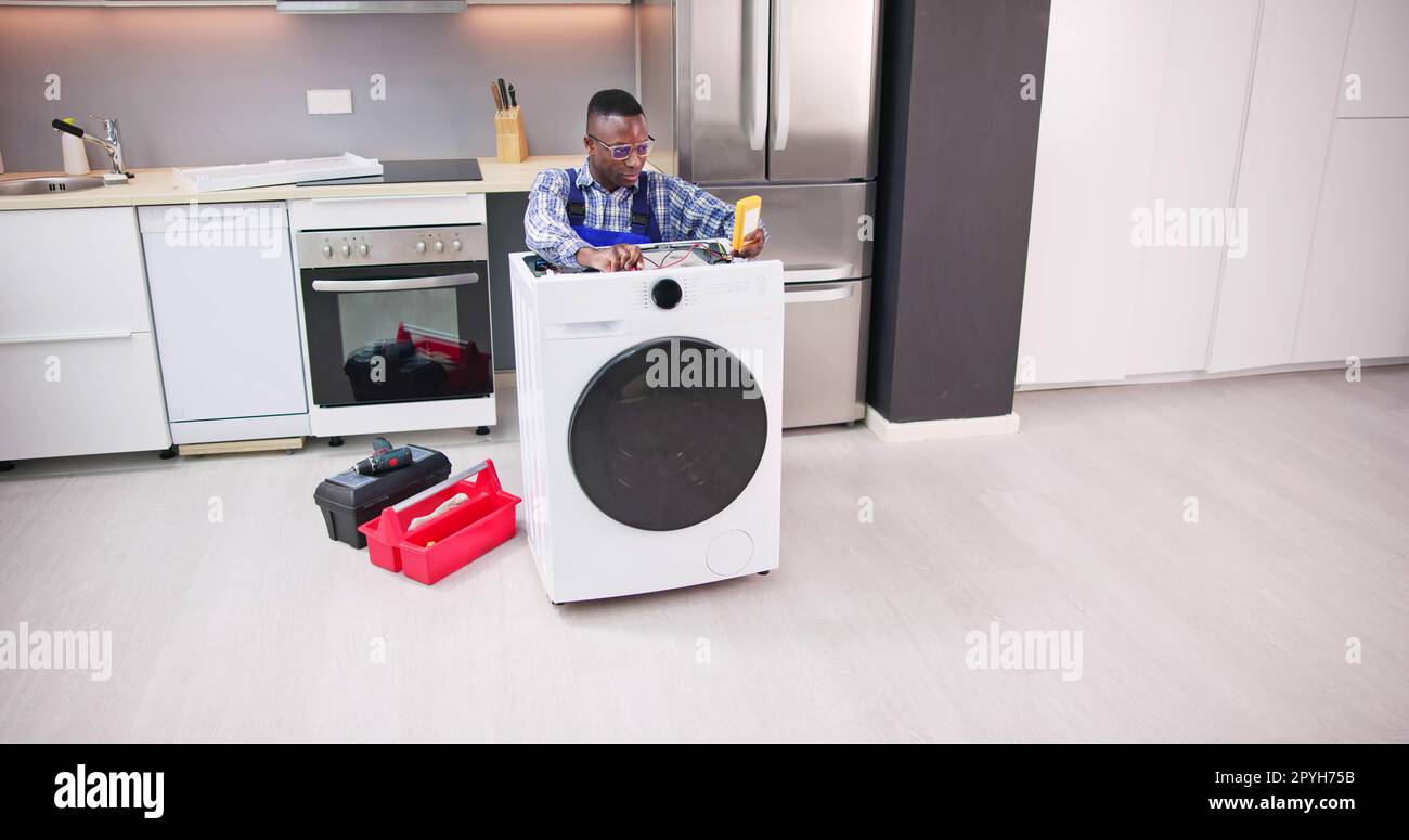 Washing Machine Appliance Repair And Install Stock Photo - Alamy