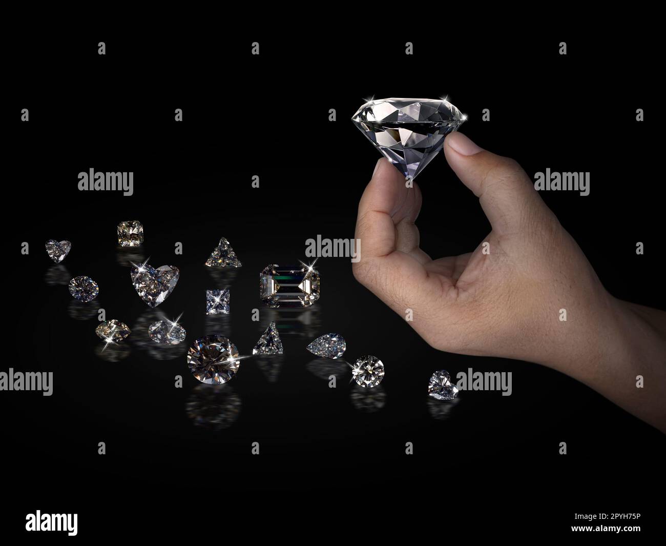 Hand holding diamond isolated on black background. concept for Select ...