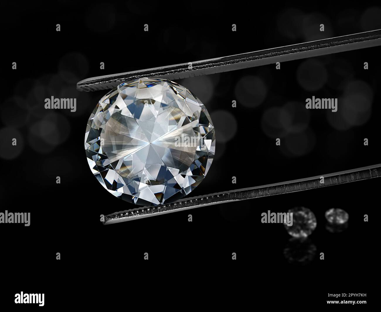 Selected diamonds In the gemstone clamp for making jewelry Stock Photo ...