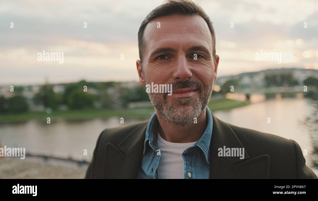 Close-up of man turning his head and posing for the camera Stock Photo ...