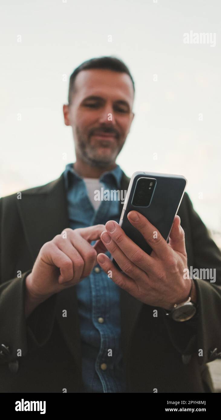 Close-up of man turning his head and posing for the camera Stock Photo ...