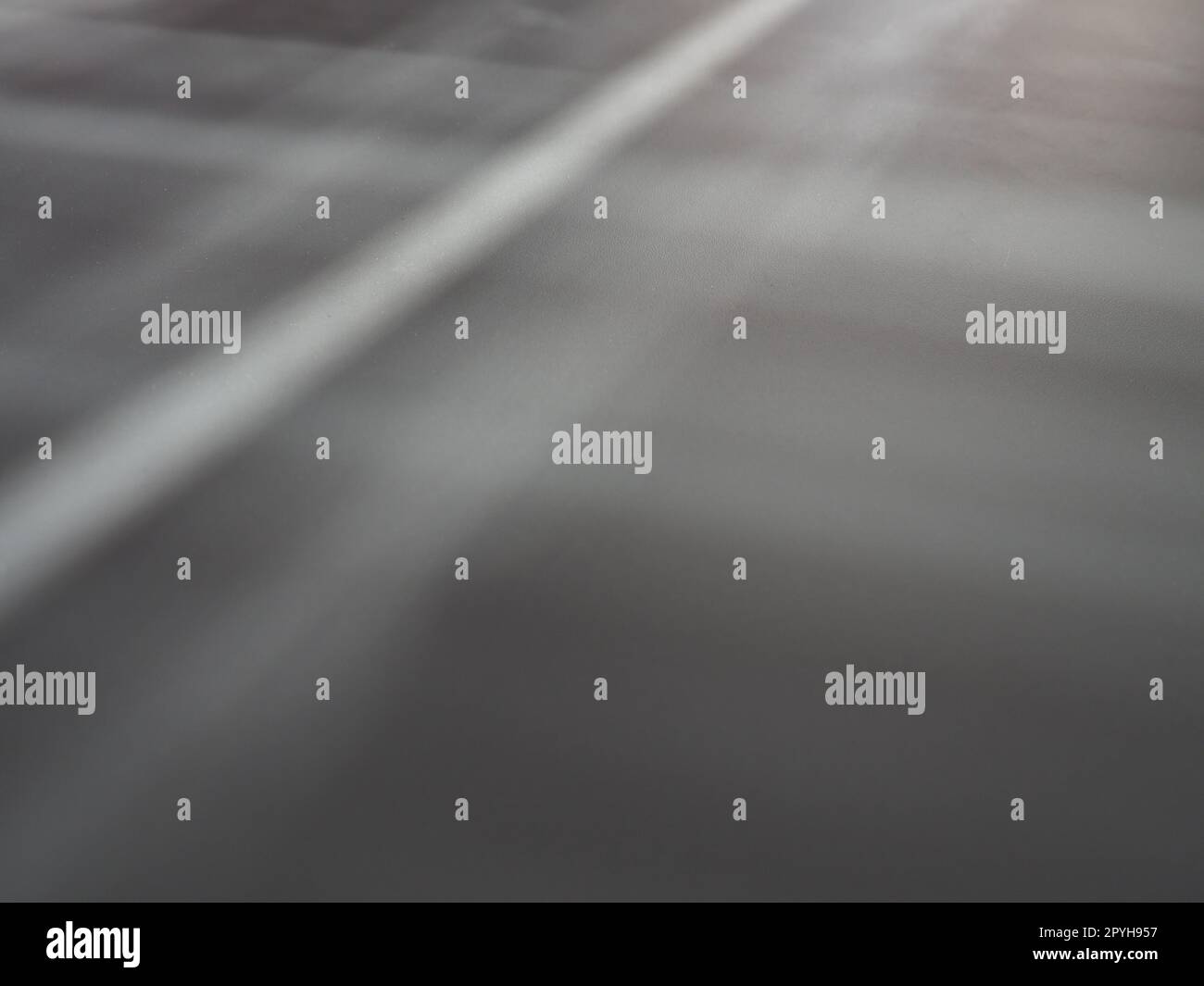 Illumination rays on gray surface. Abstract rays of light and lens ...