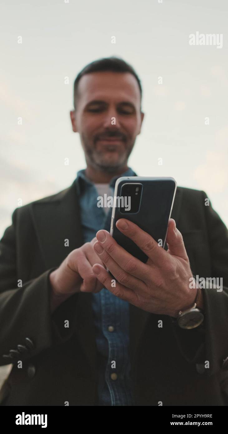 Close-up of man turning his head and posing for the camera Stock Photo ...