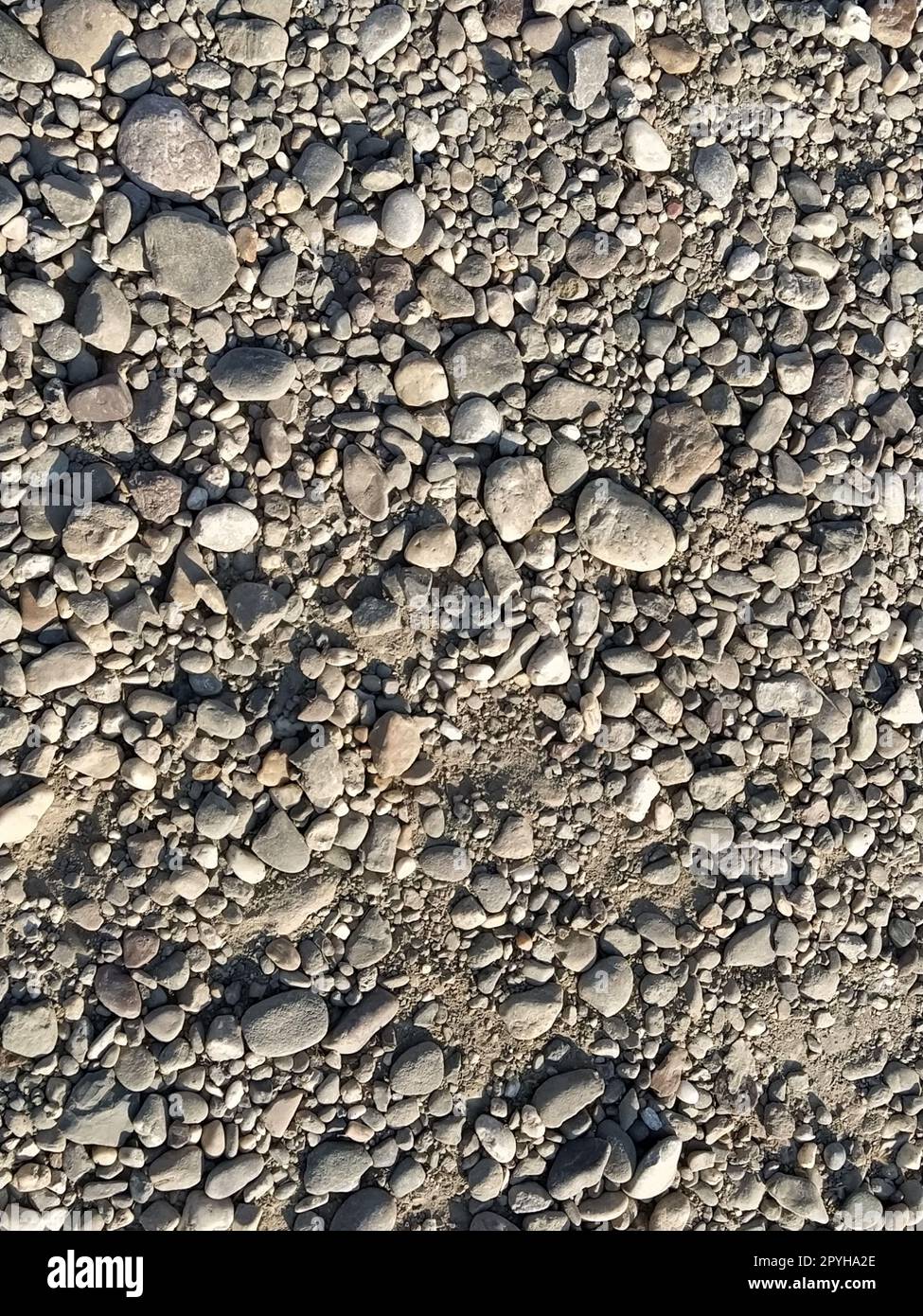 Grey stones background. gray stones. Small and large crushed stone ...