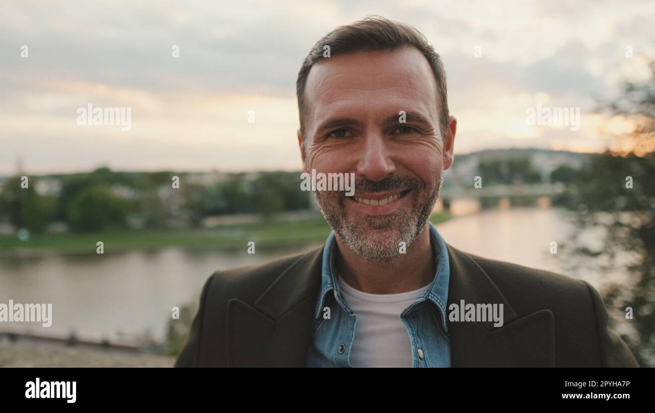 Close-up of man turning his head and posing for the camera Stock Photo ...