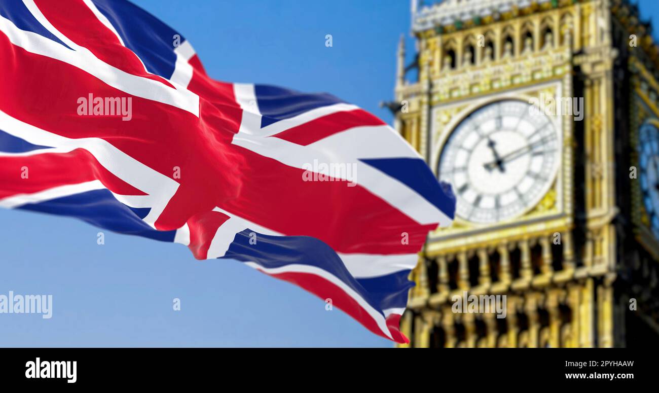 UK flag waving on blurred Big Ben Background Stock Photo - Alamy
