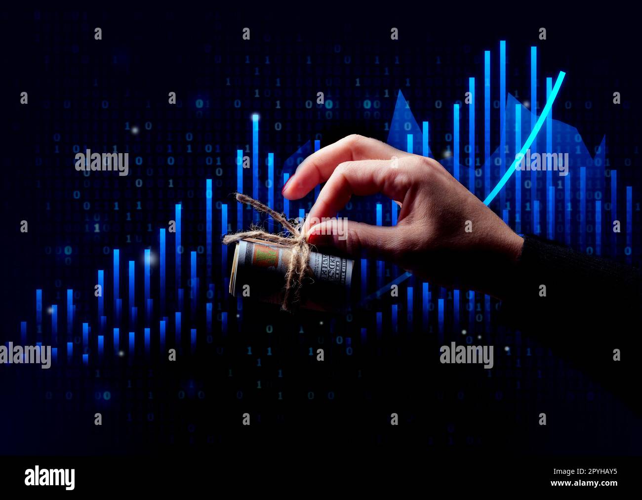 Roll of one hundred dollar bills tied with a rope and a graph with ...