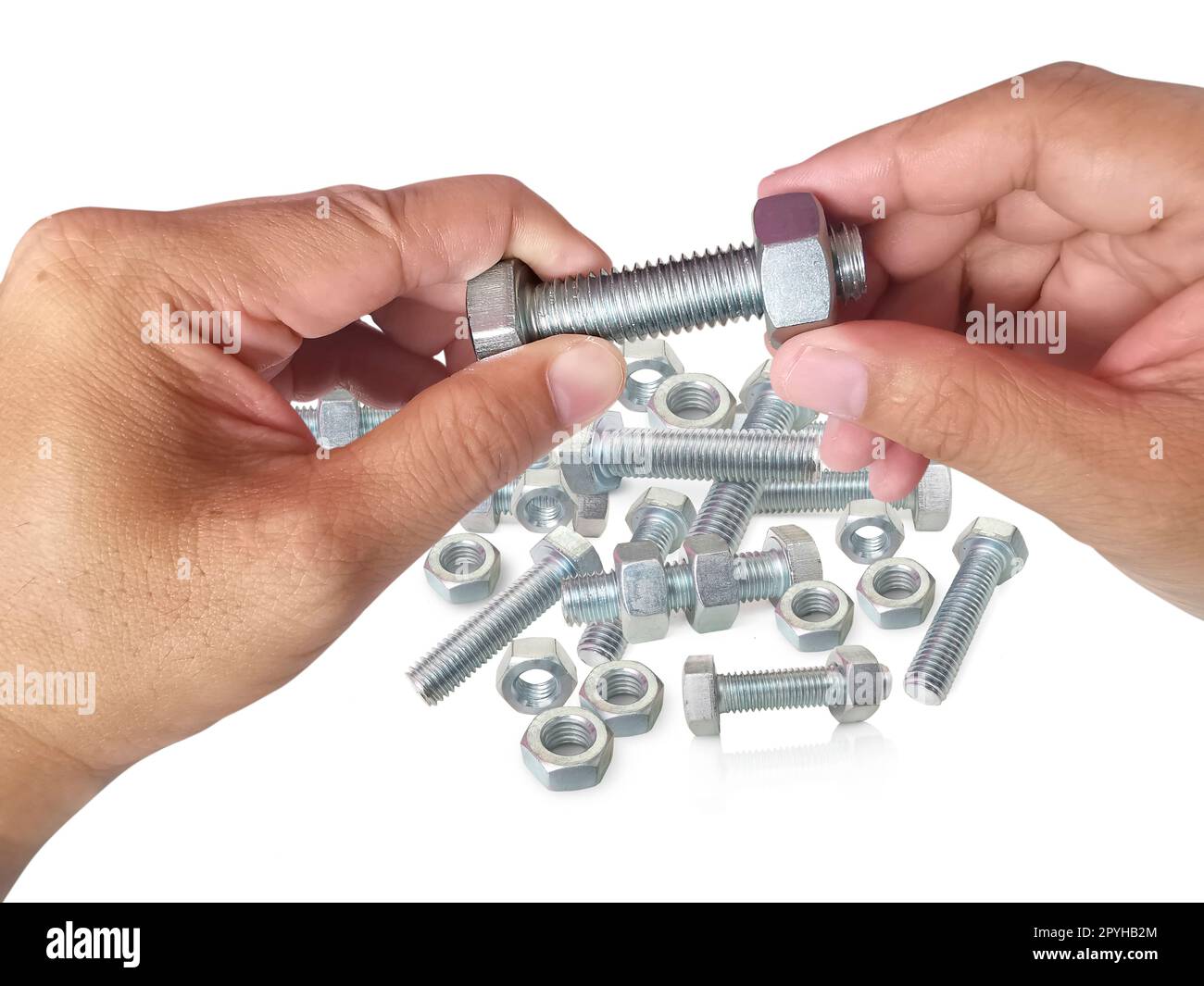 Nut and screw on hand on white background Stock Photo - Alamy