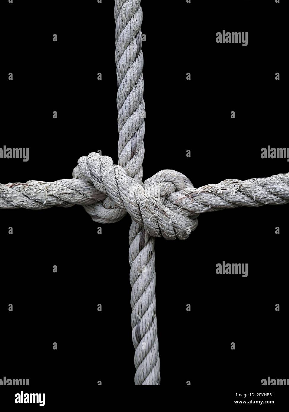 Rope knot on black background. Concept for unity Stock Photo - Alamy