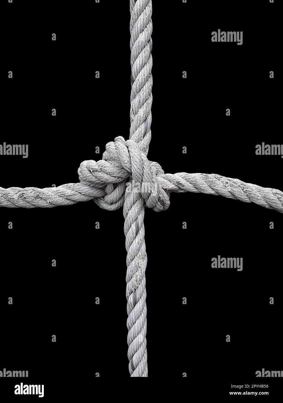 Rope knot on black background. Concept for unity Stock Photo - Alamy