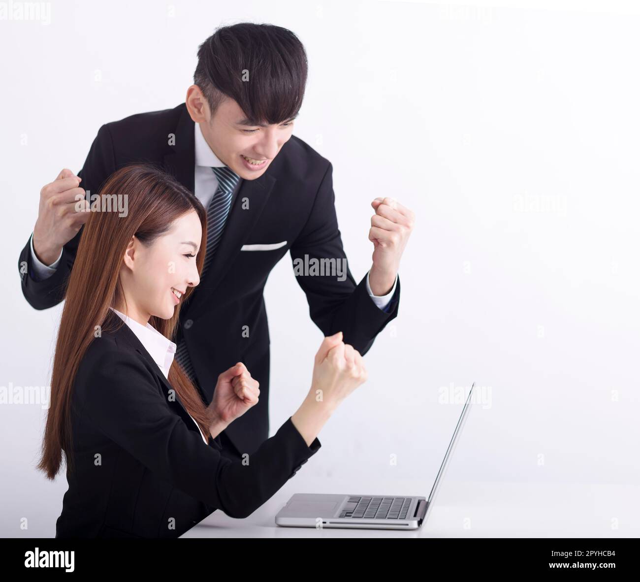 Business team using laptop and working together in office Stock Photo ...