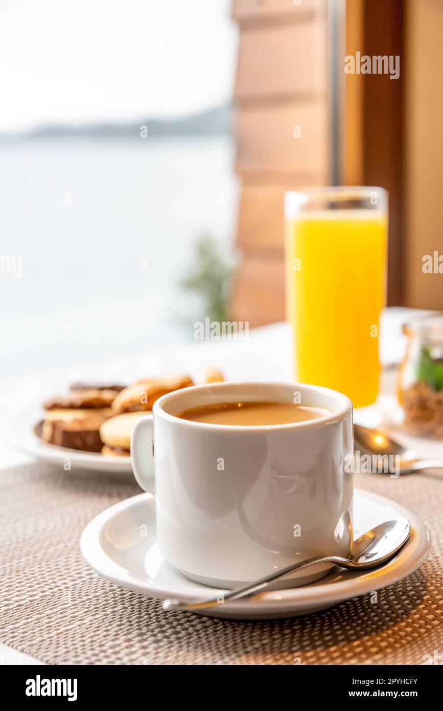 single coffee cup on wood table, latte art concept,love signature with ...